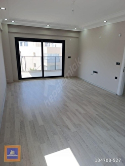 Havuzlu sitede sıfır 1+1 60 m2 ön cephe daire sahile 1200m mesafede ...